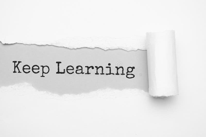 The Text Keep Learning Appearing Behind Torn Brown Paper Stock Image ...
