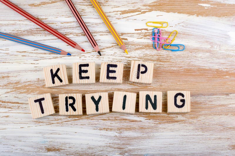 Text: Keep Trying from Wooden Letterson on Wooden Background Stock ...