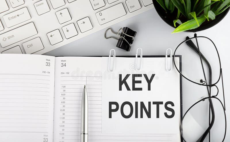 Text KEY POINTS on White Stickers on Notebook with Keyboard and Glasses ...