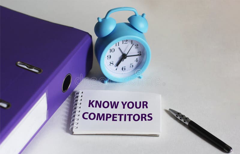 The Text Know Your Competitors is Written on a Notebook and a White ...