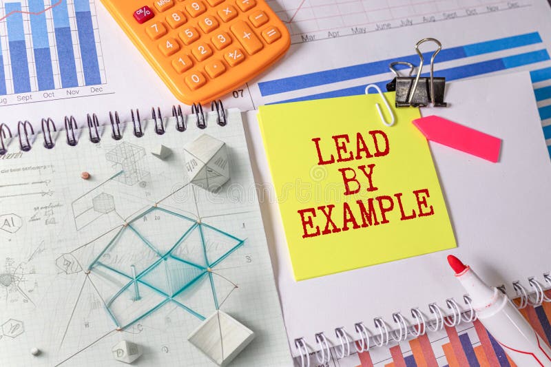 Text LEAD by EXAMPLE on Office Desk Table with Keyboard, Notepad and ...