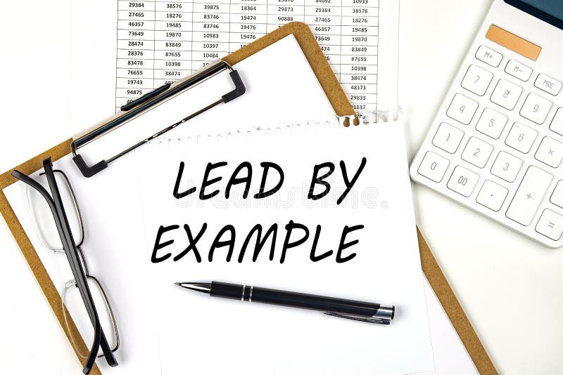 Text LEAD by EXAMPLE on the White Paper on Clipboard with Chart and ...