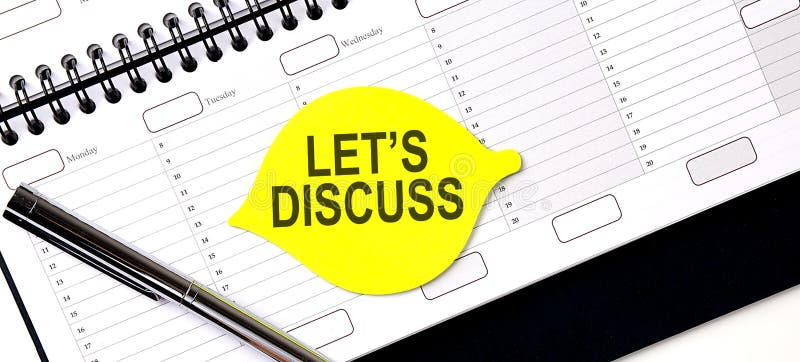 Text LET`S DISCUSS , on the Yellow Sticker on the Planning Stock Image ... Text LET`S DISCUSS , on the Yellow Sticker on the Planning Stock Image ...
