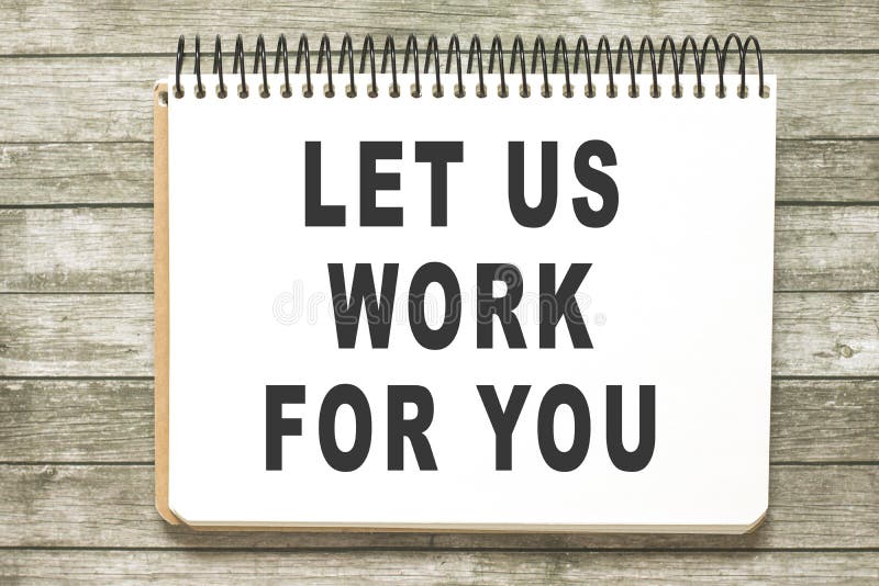 Text Let Us Work for You on Notebook Page on Wooden Table Stock Image ...