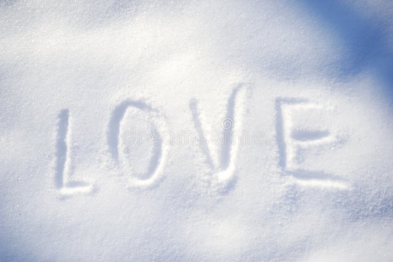 Text LOVE on the snow stock photo. Image of season, drawn - 63381950