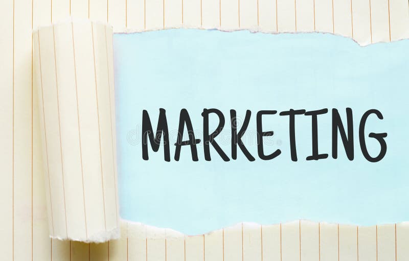 The Text MARKETING Appearing Behind Torn White Paper Stock Photo ...