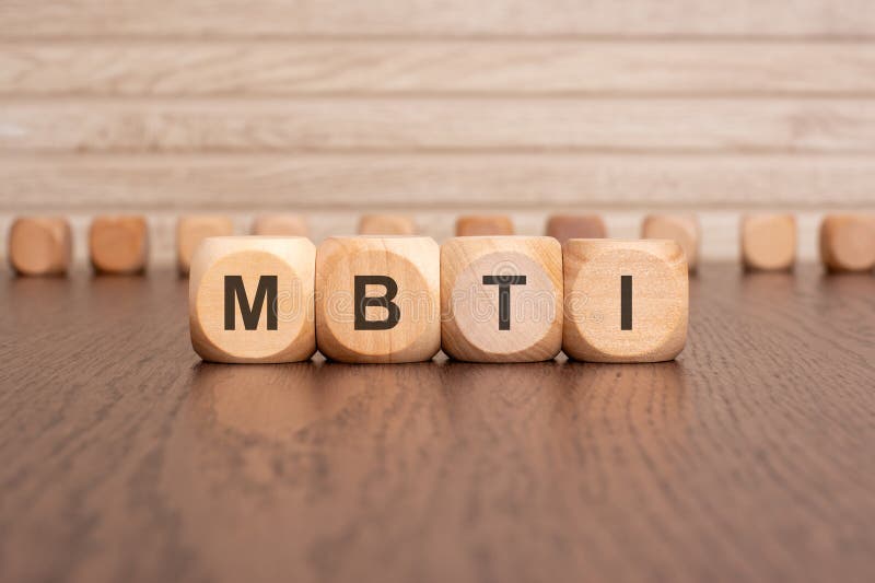 The Text MBTI is Written on Wooden Cubes on a Brown Background Stock ...