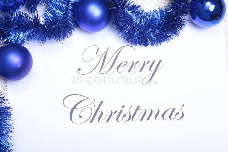 Text Merry Christmas on Paper with Blue Balls and Gift Box Stock Image ...