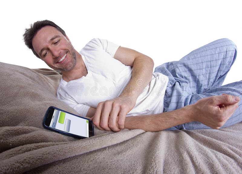 Text Messages in Bed stock image. Image of bedtime, gadget - 40877589