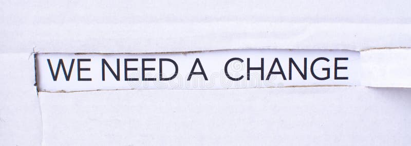The Text we Need a Change Appearing Behind Torn White Paper. for Your ...