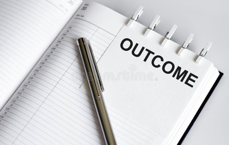 OUTCOME Text on Notepad with Paper Sheet with Pen and Wooden House ...