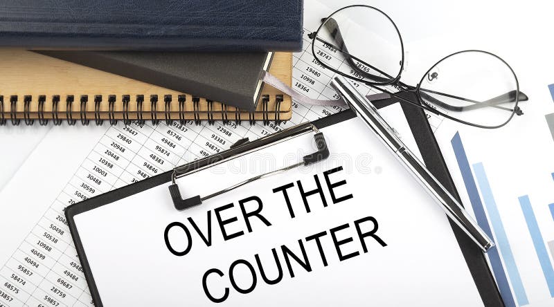 Text OVER the COUNTER on Office Desk Table with Notebooks, Supplies ...