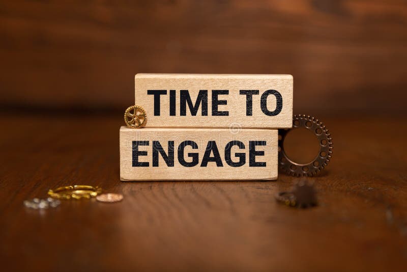 Time To Engage is Shown Using the Text and Picture of Clock Stock Image ...