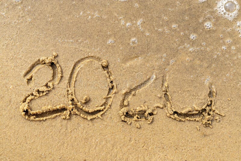 2020 Text Painted on the Sand. Water Washed Away the Text on the Beach ...