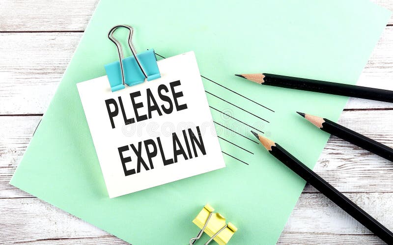 Text PLEASE EXPLAIN on the Short Note with Pencils on Wooden Background ...