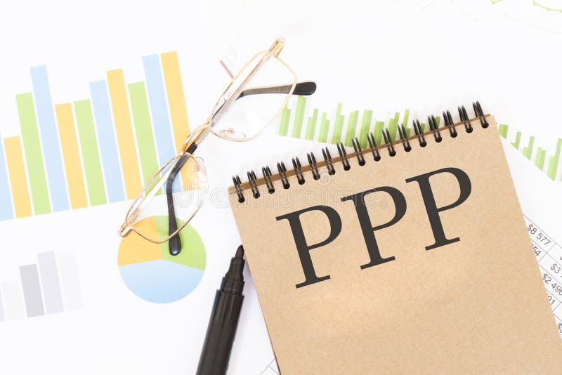 Text PPP LOAN on Brown Paper Notepad on the Table with Diagram ...