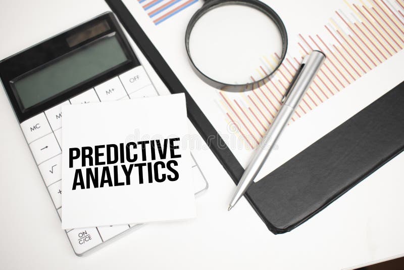 Text PREDICTIVE ANALYTICS on Easel with Office Tools and Paper.Top View ...