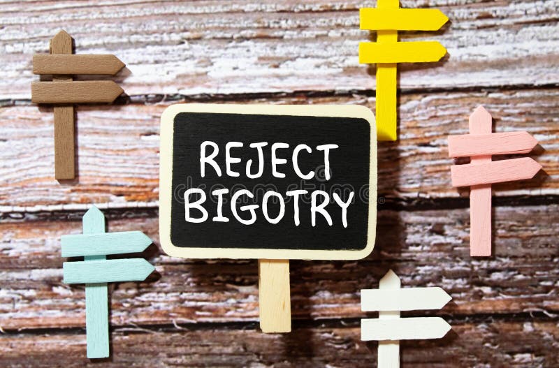 Text Prevent Bigotry Written in Blue Under a Wire Mesh Stock ...