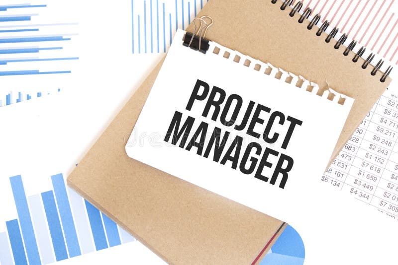 Text PROJECT MANAGER on White Paper Sheet and Brown Paper Notepad on ...