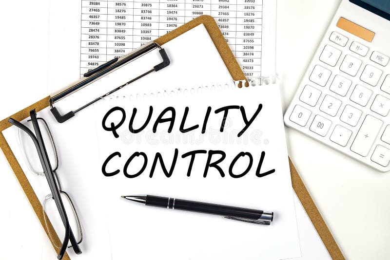 Text QUALITY CONTROL on the White Paper on Clipboard with Chart and ...