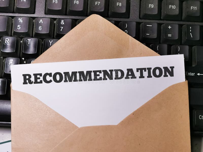 Text RECOMMENDATION Written on White Paper Note in the Envelope on ...