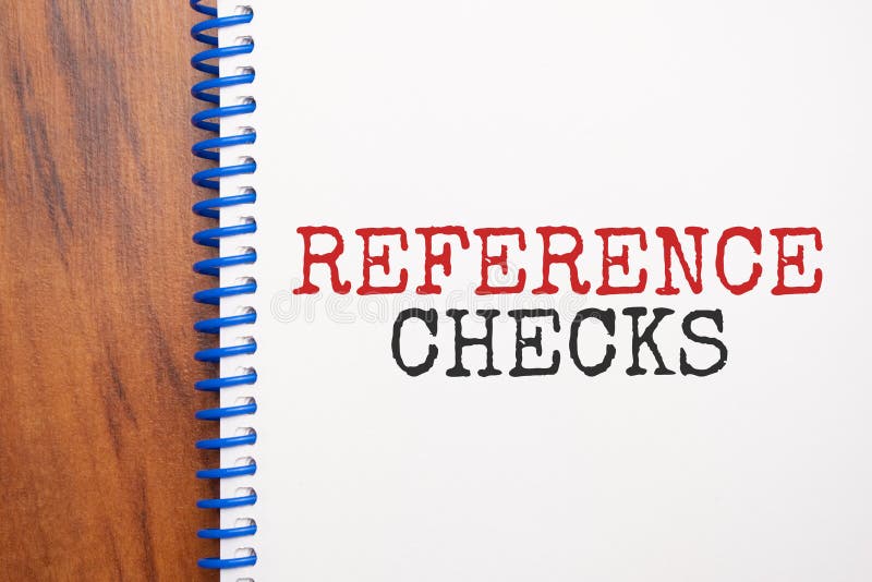 Text REFERENCE CHECKS Written in Notepad, Office Wood Table from Above ...