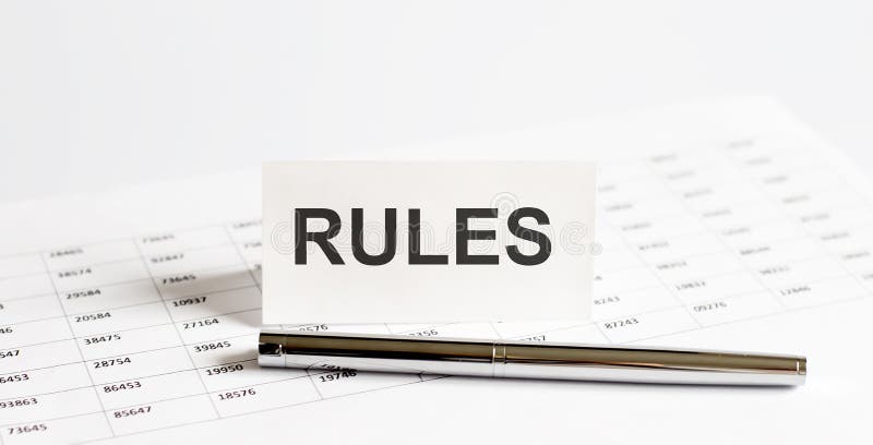 Text RULES on Stickers,pen on the Background of Documents. Financial ...