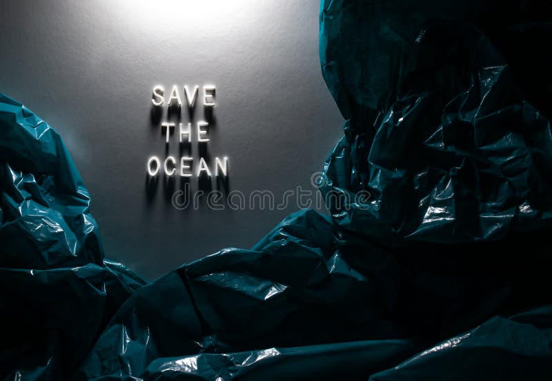 Save the Ocean Text on Blue Bakground with Sea Shell on Top of Plastic ...
