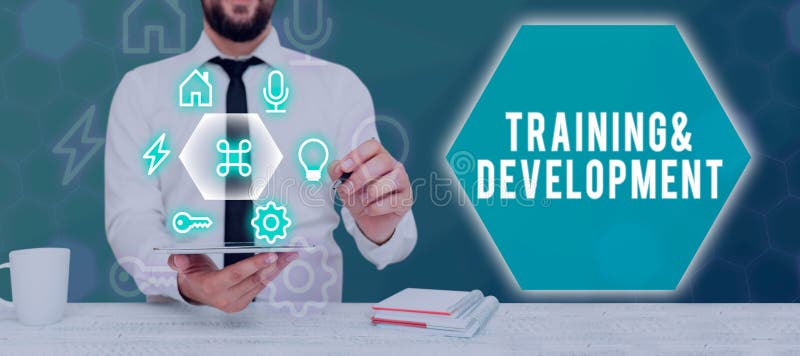 Text Sign Showing Traininganddevelopment. Business Approach Organize ...