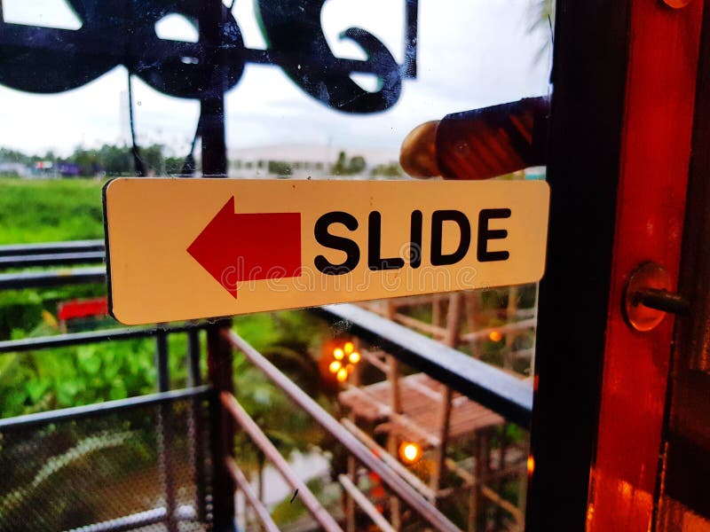 Text and Sign on Sliding Glass Door Stock Photo - Image of entrance ...