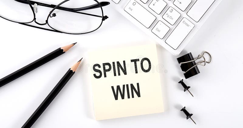 Text SPIN TO WIN on the Sticker with Keyboard , Pencils and Office ...