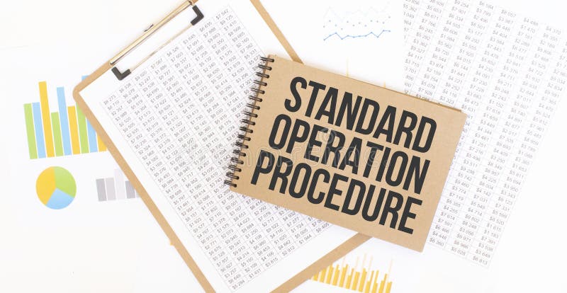 Text Standard Operation Procedure on Brown Paper Notepad on the Table ...