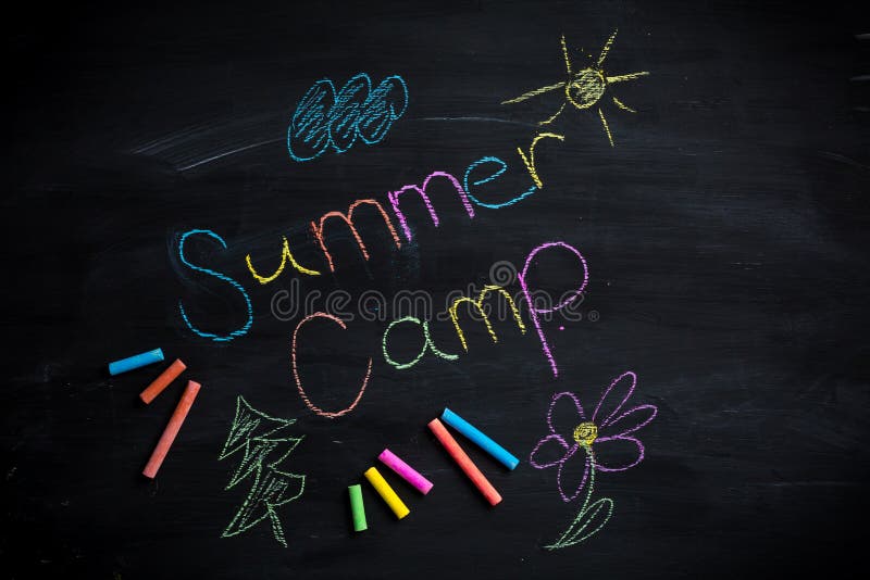Text Summer Camp Written on Black Chalkboard, with Chalk Sticks of ...