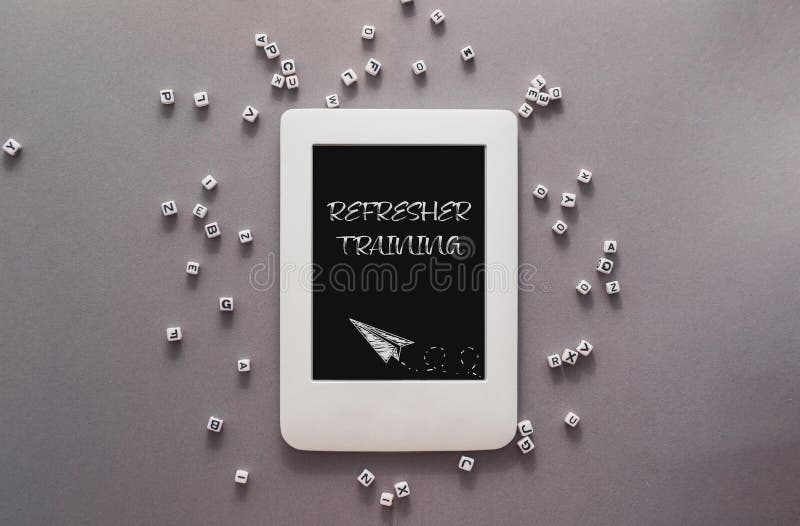 Text on Tablet Refresher Training on Gray Background. Stock Photo ...