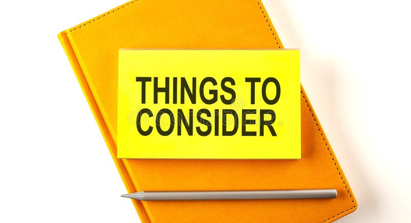 Text THINGS TO CONSIDER on Sticker on the Yellow Notebook Stock Photo ...