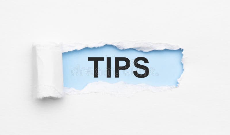 The Text Tips Appearing Behind Torn Yellow Paper Stock Image - Image of ...