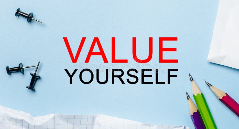 Text Value Yourself on a White Notepad with Pencils on a Blue ...