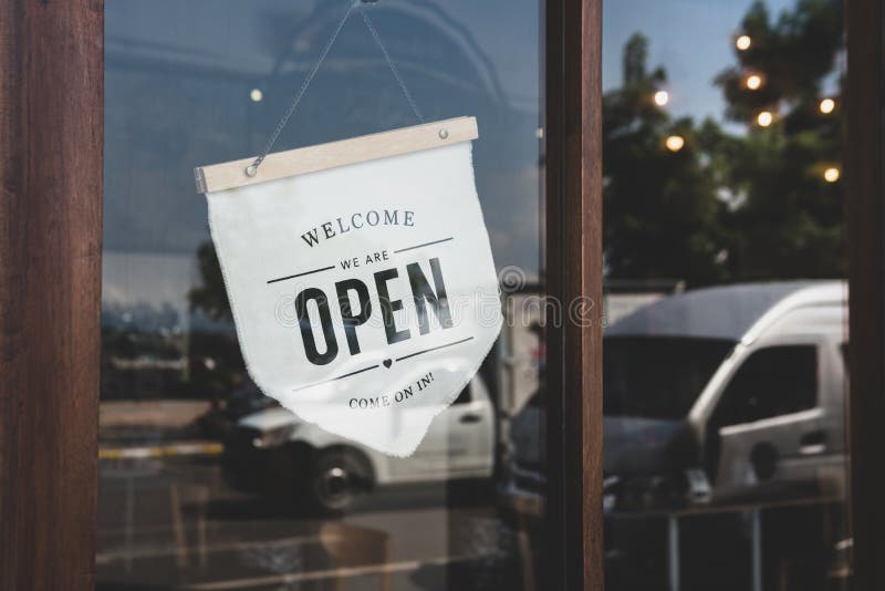 Text on Vintage White Sign `Welcome we are Open Come on in` in Cafe ...