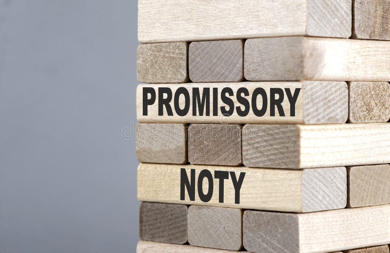 PROMISSORY NOTE Text on a Sticky on Red Notebook on Chart Background ...