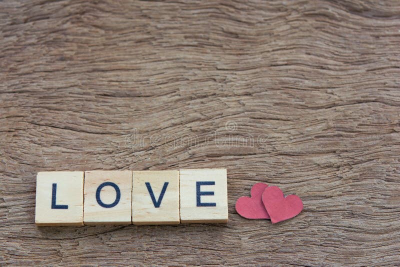 Text Wooden Blocks Spelling the Word Love on Wooden Background Stock ...