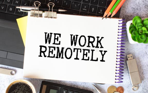 Text we WORK REMOTELY on White Noteboock Stock Photo - Image of stay ...