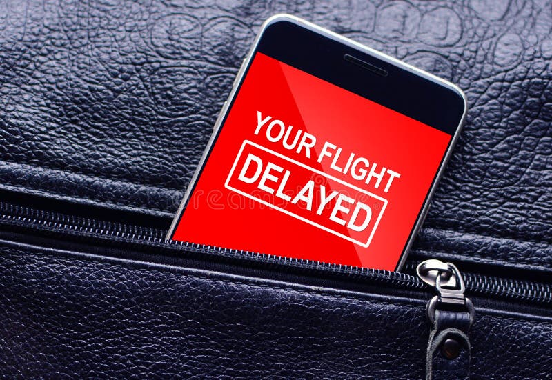 Flight Delayed Notification on Smartphone Announces Bad News To Tourist ...
