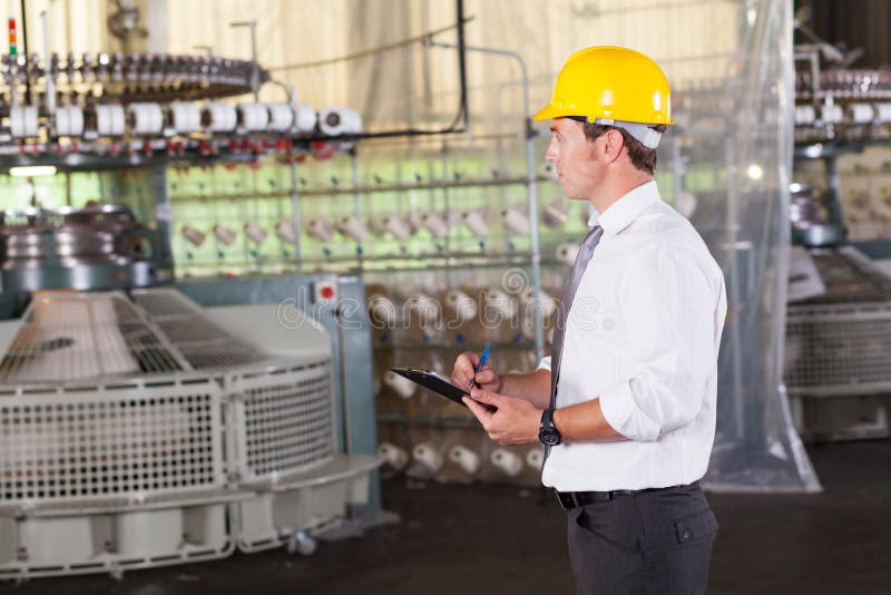Textile production manager stock photo. Image of business - 27309818