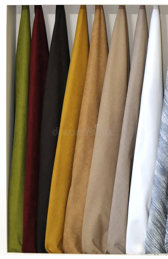 Textile samples on wall stock image. Image of fabric - 180380855