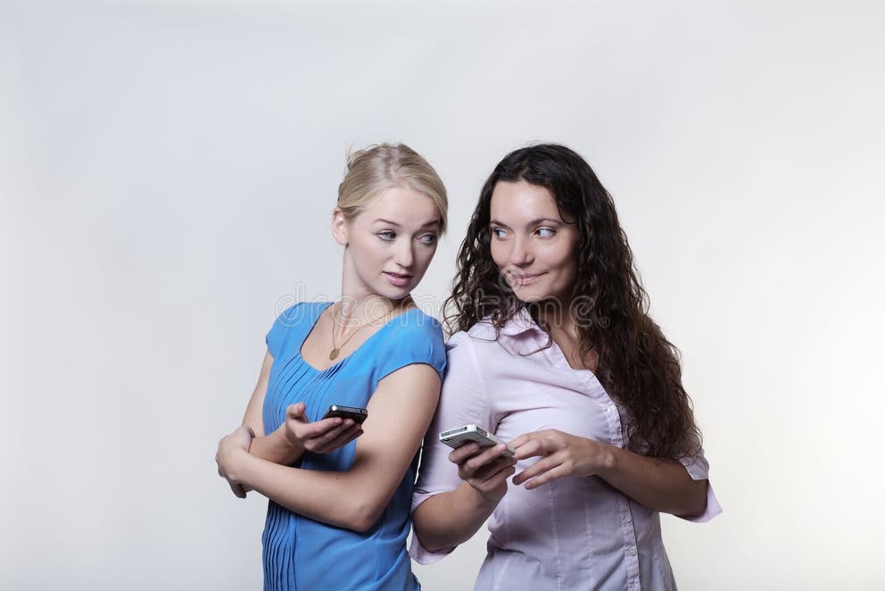 Texting each other stock photo. Image of mobile, cellular - 27790716