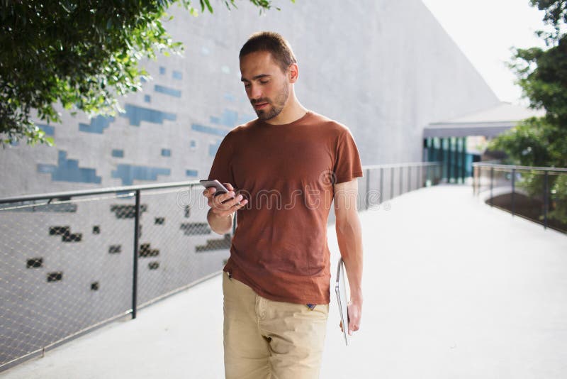 Texting while walking stock photo. Image of laptop, talking - 87510322