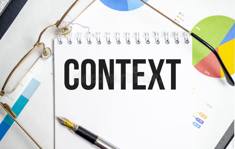 Texto De Contexto Escrito No Notebook Branco Com Calculadora E Caneta ...