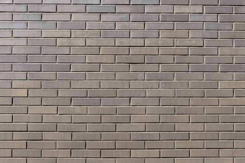 Textura De Fundo De Uma Parede Cinzenta De Tijolos Imagem De Stock