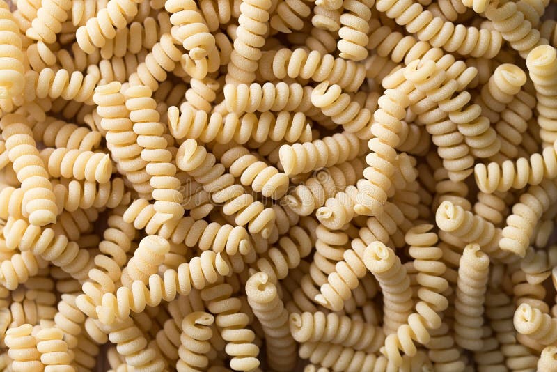 Textura De Pasta Rizada Macarrones De Trigo Tradicional Foto de archivo ...