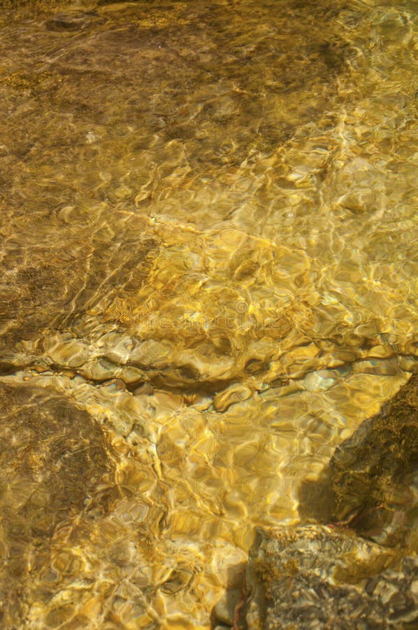 Textura Del Agua De Rocas De Oro Foto de archivo - Imagen de rocas ...